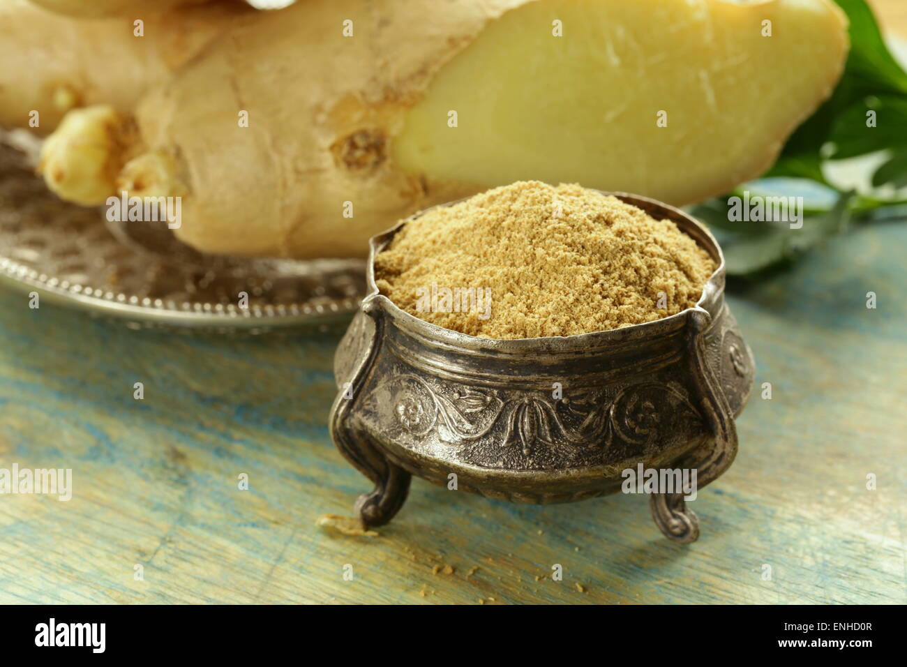 ground and fresh ginger traditional oriental spice Stock Photo - Alamy