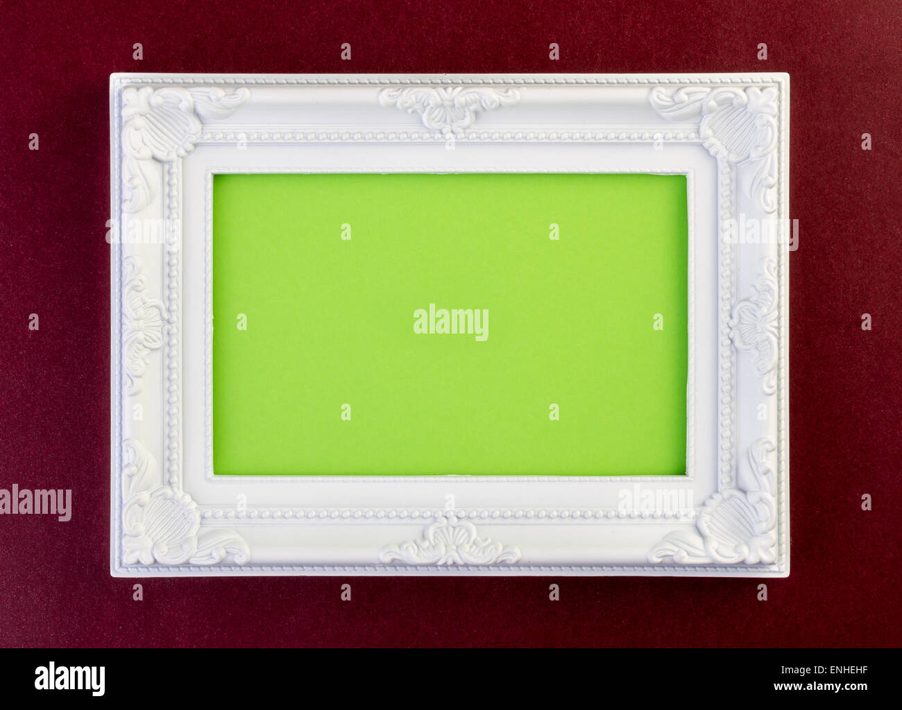 White Frame on dark red with green for your copy Stock Photo - Alamy