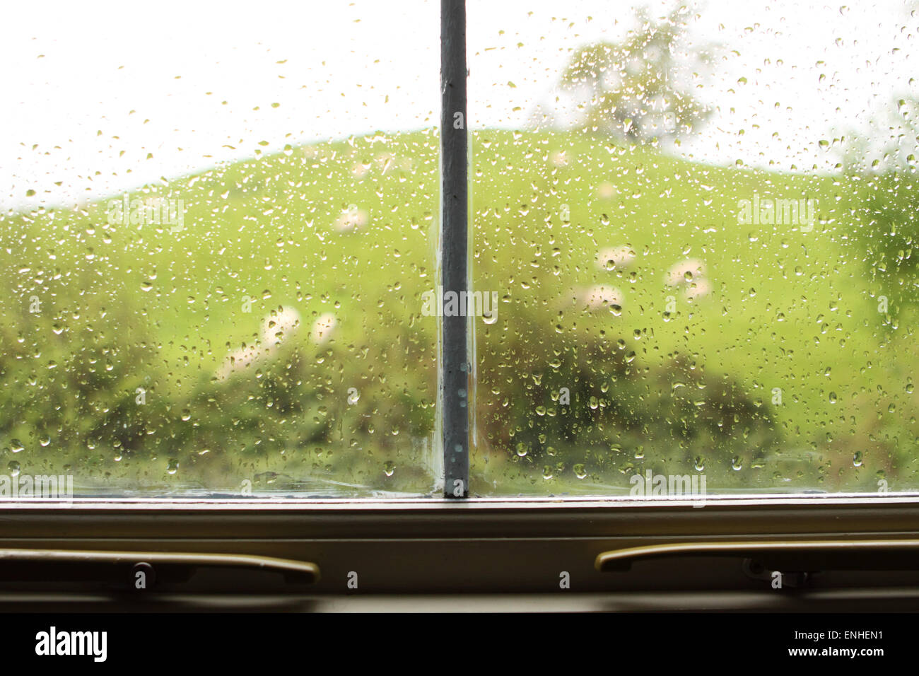 View from house window of rain hi-res stock photography and images - Alamy