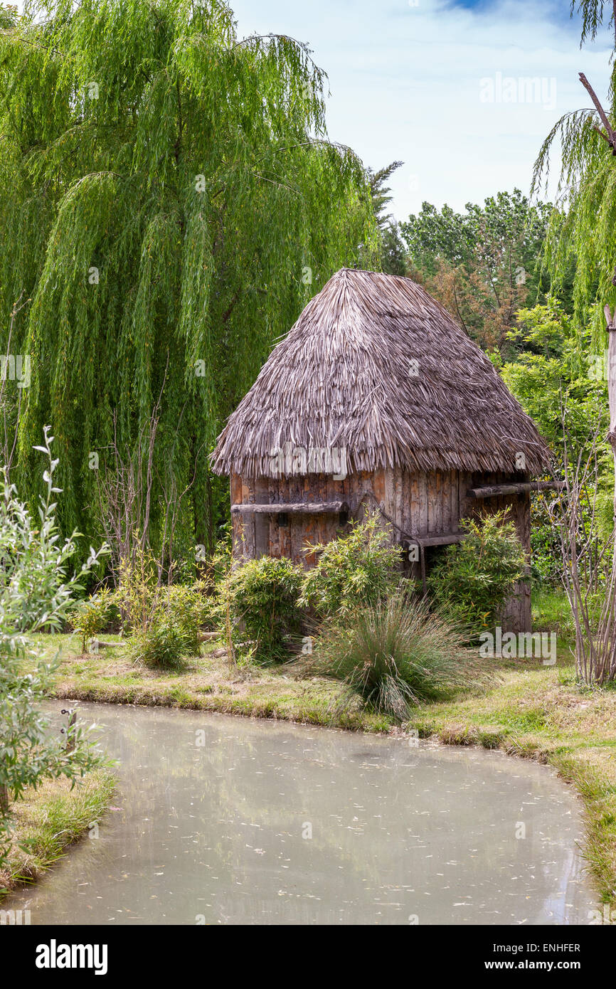 Small hut with a thatched roof Stock Photo - Alamy