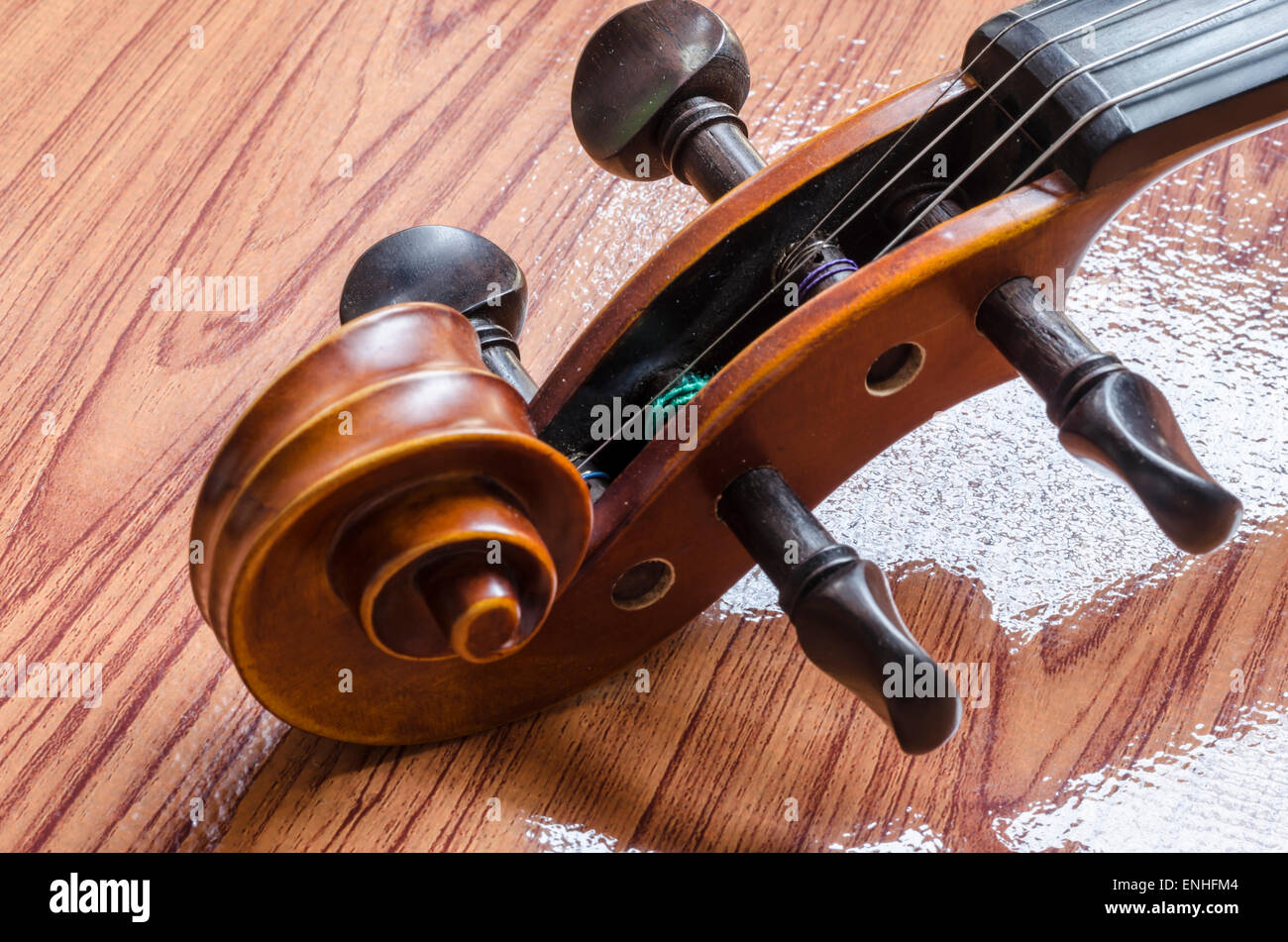 string instrument "violin" on wood background Stock Photo - Alamy
