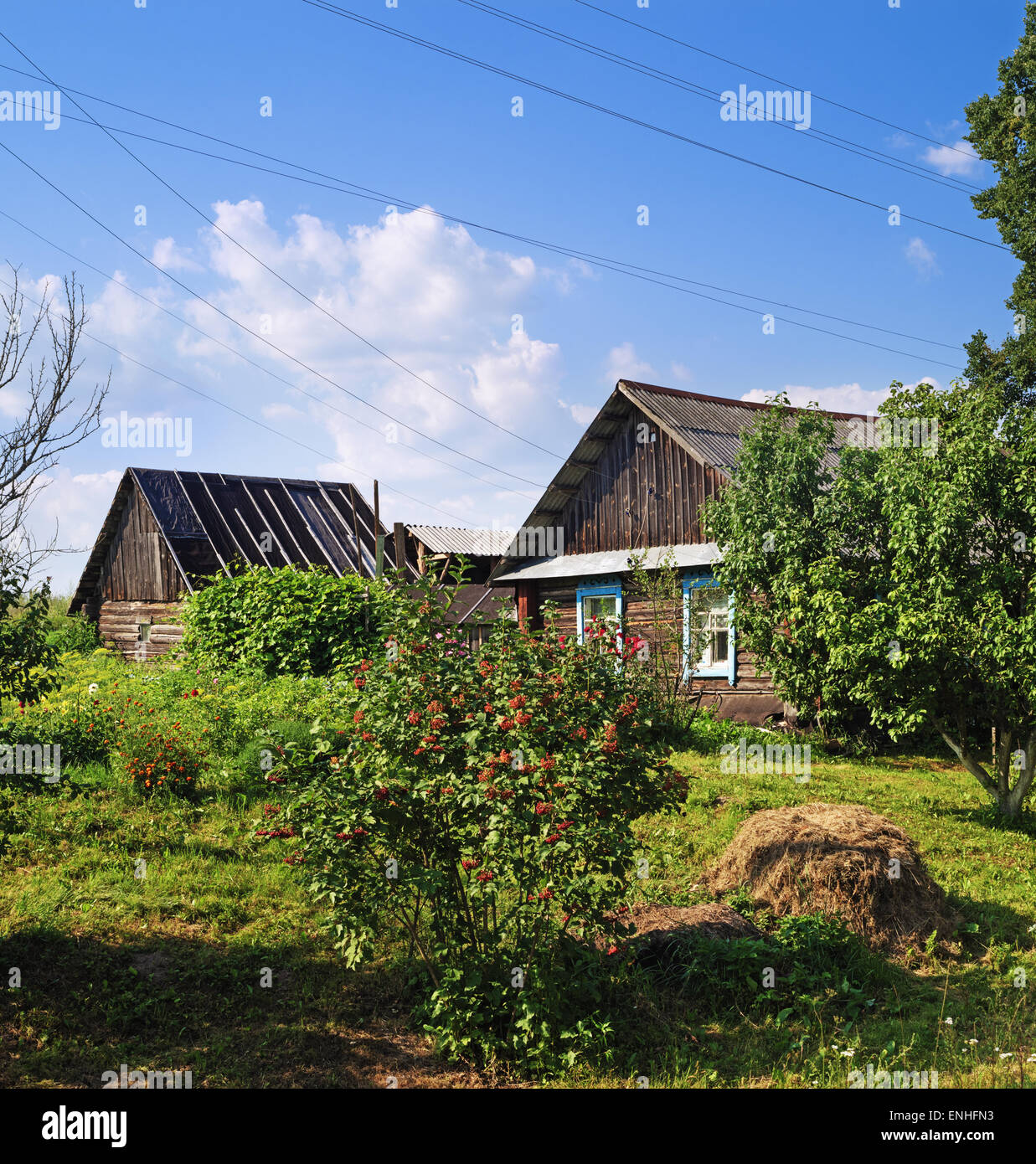 Village landscape with old house and garden Stock Photo - Alamy