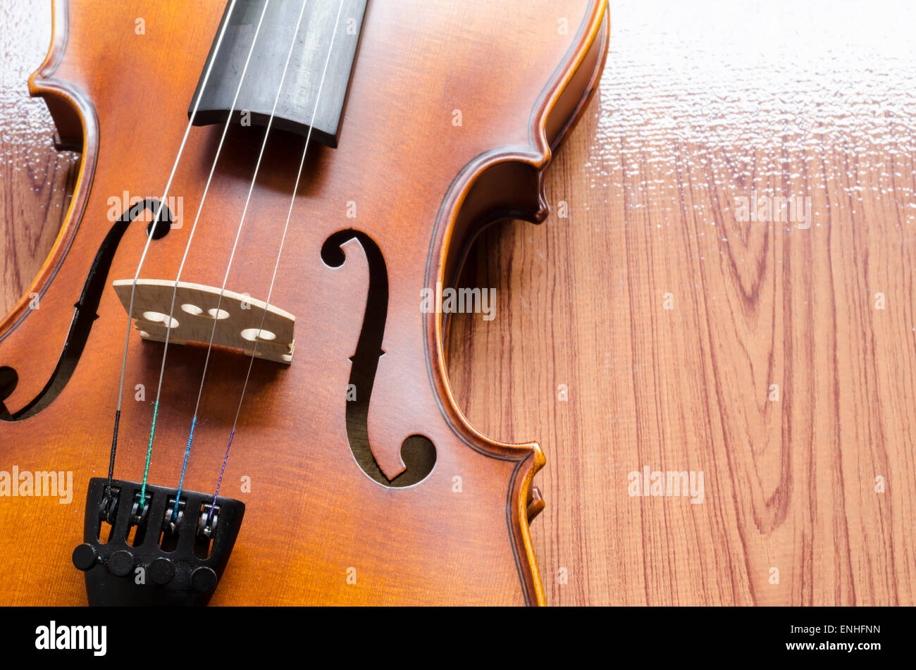 string instrument "violin" on wood background Stock Photo - Alamy