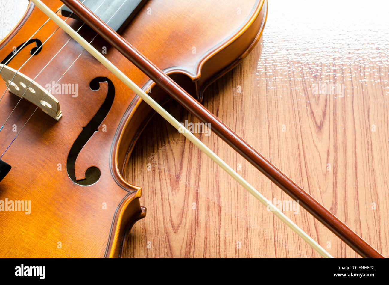 string instrument "violin" on wood background Stock Photo - Alamy