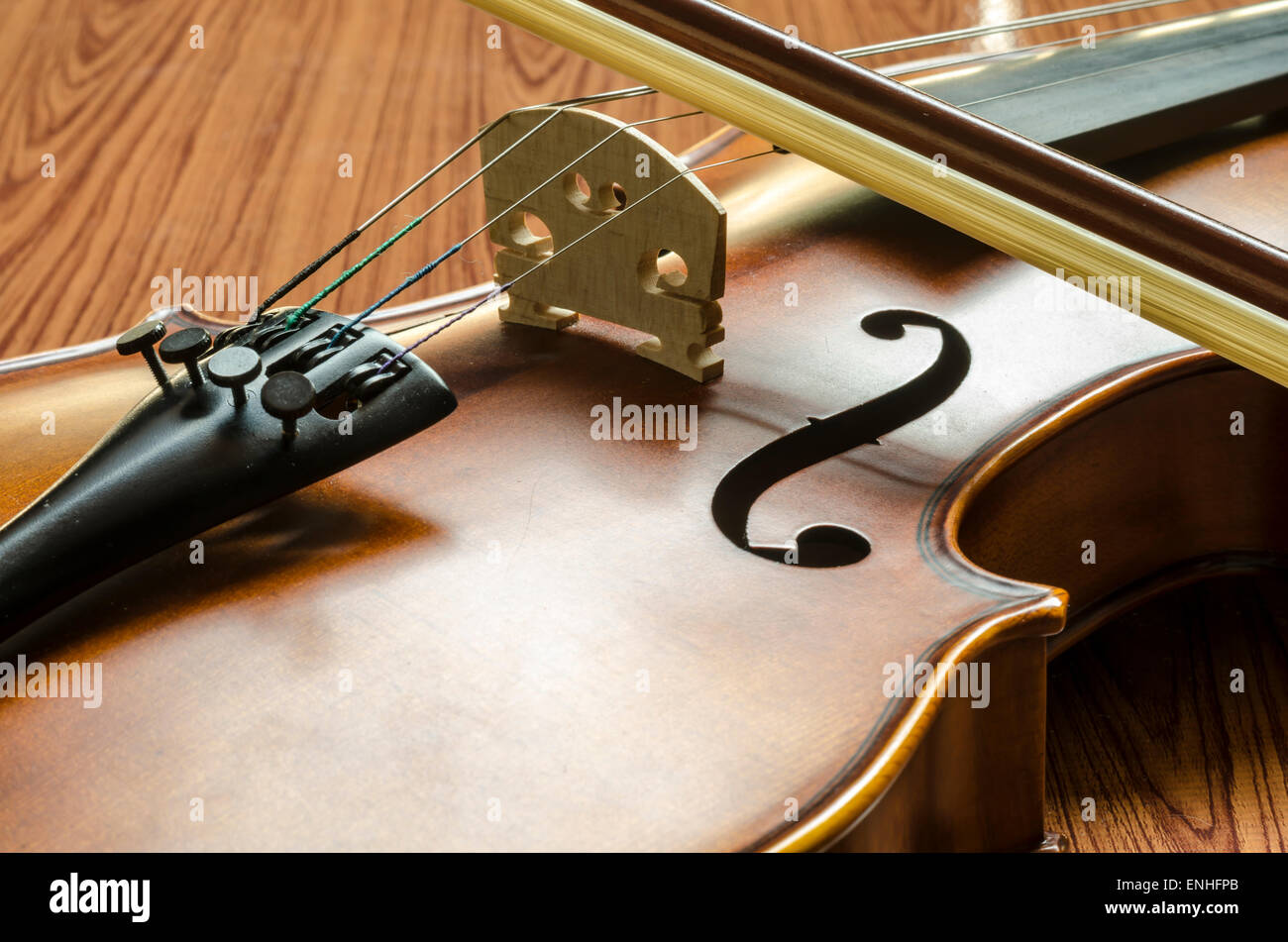 string instrument "violin" on wood background Stock Photo - Alamy
