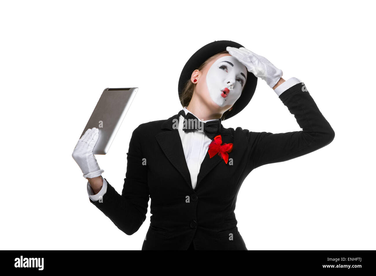 business woman in the image mime holding tablet PC Stock Photo - Alamy