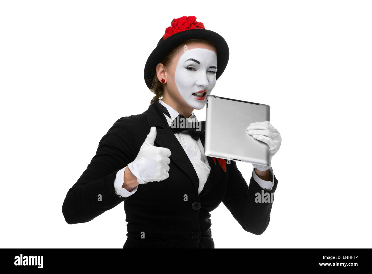 business woman in the image mime holding tablet PC Stock Photo - Alamy