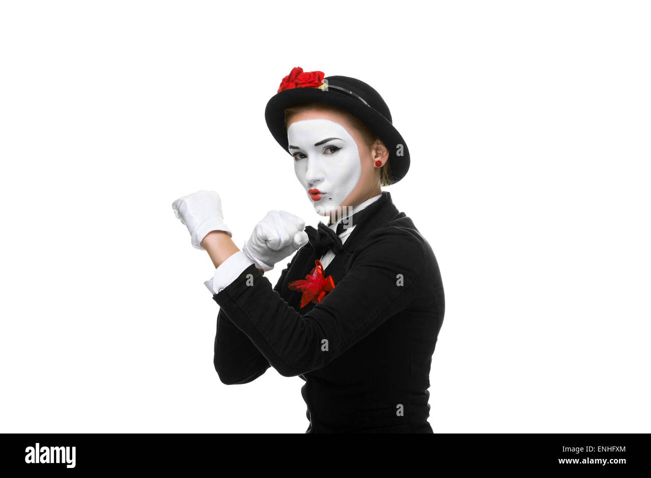 Isolated young business woman showing power Stock Photo - Alamy