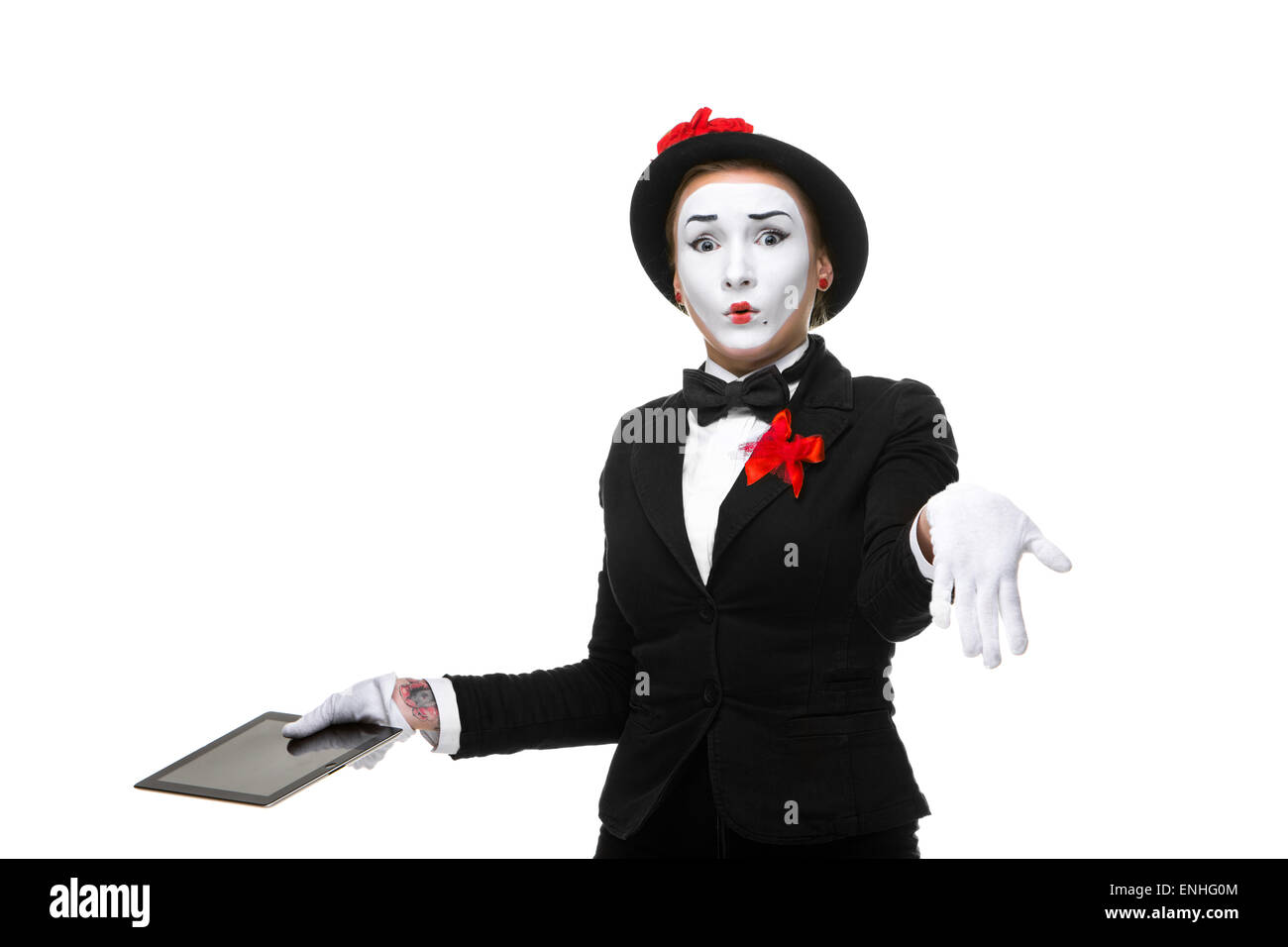 business woman in the image mime holding tablet PC Stock Photo - Alamy
