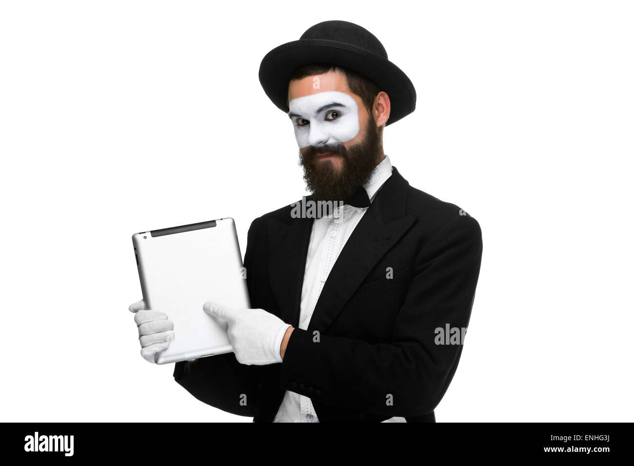 Man with a face mime working on laptop Stock Photo - Alamy