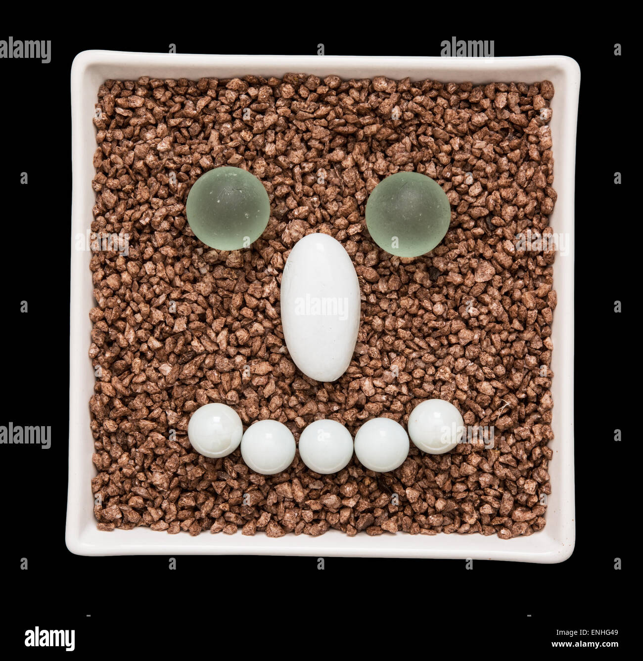 Face pebbles smile hi-res stock photography and images - Alamy