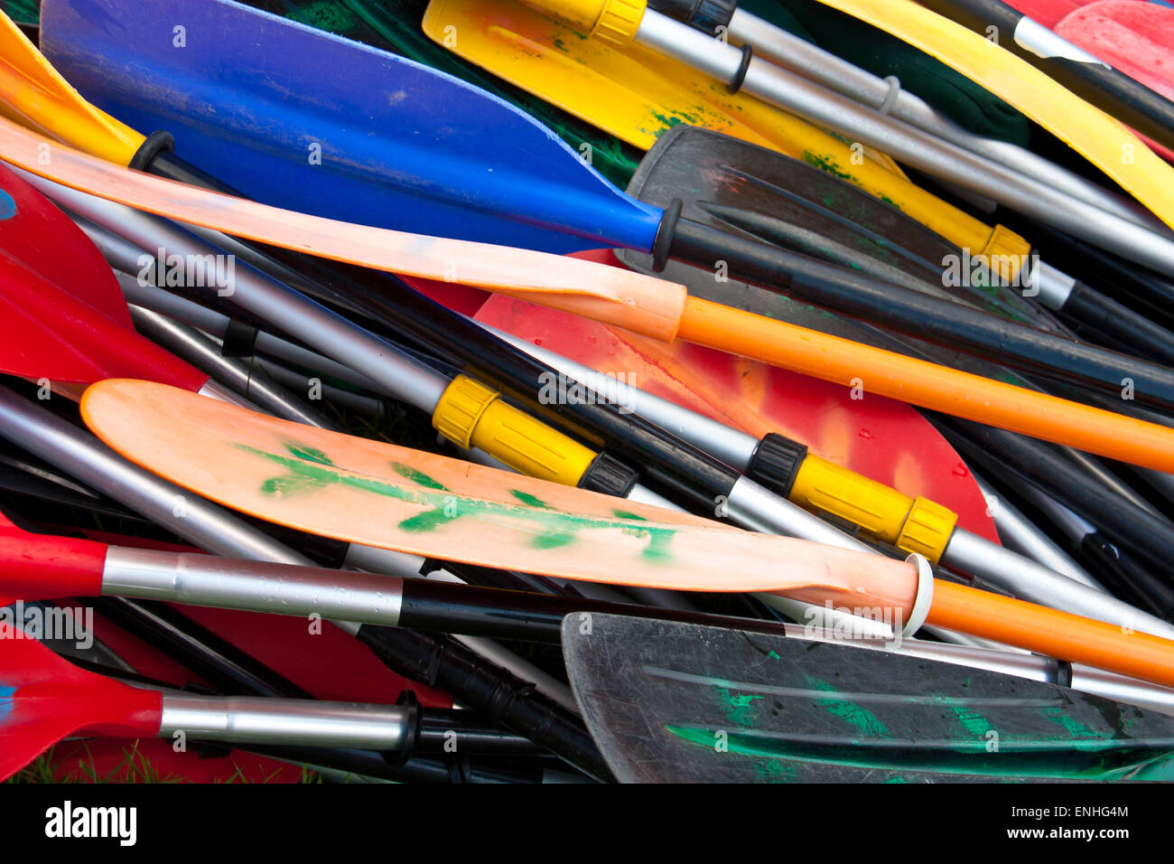 Bunch of plastic colorful oars Stock Photo - Alamy