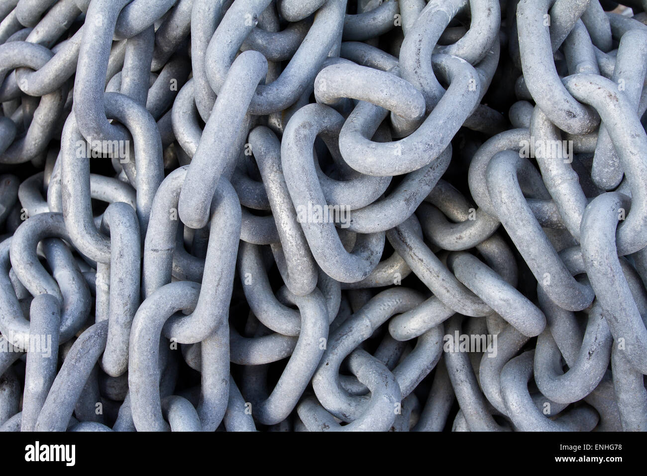 Chain with big shackles in a port Stock Photo - Alamy