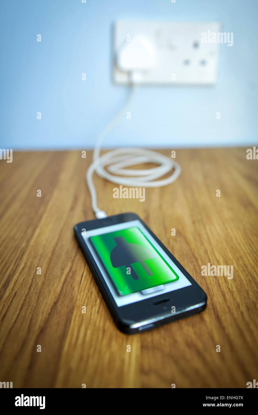 Iphone charging in a socket hi-res stock photography and images - Alamy