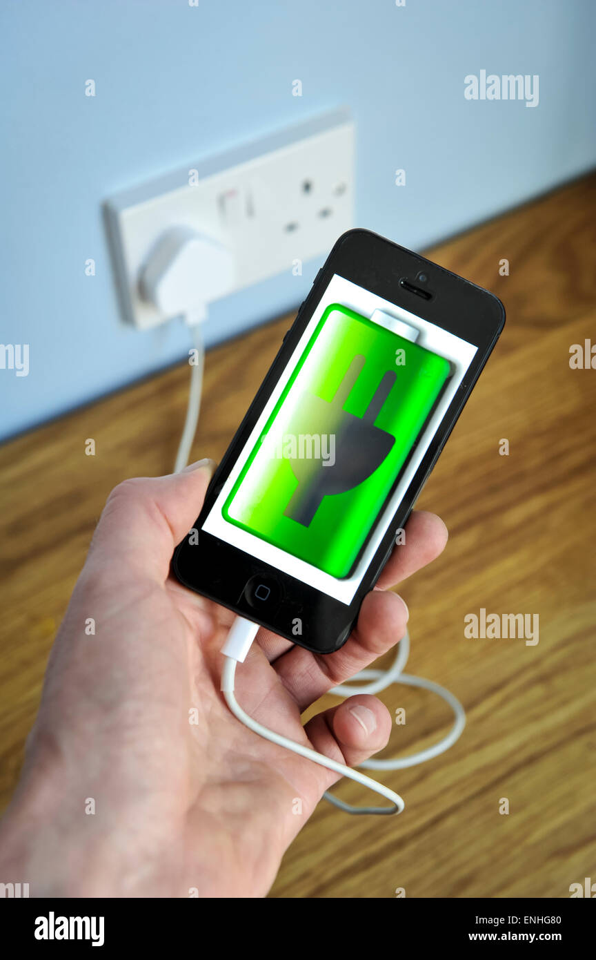 Iphone charging in a socket hi-res stock photography and images - Alamy
