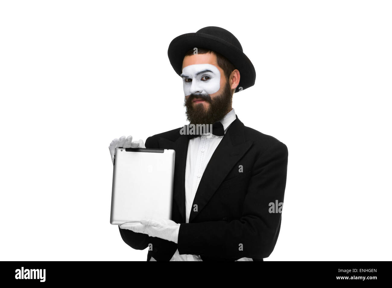 Man with a face mime working on laptop Stock Photo - Alamy