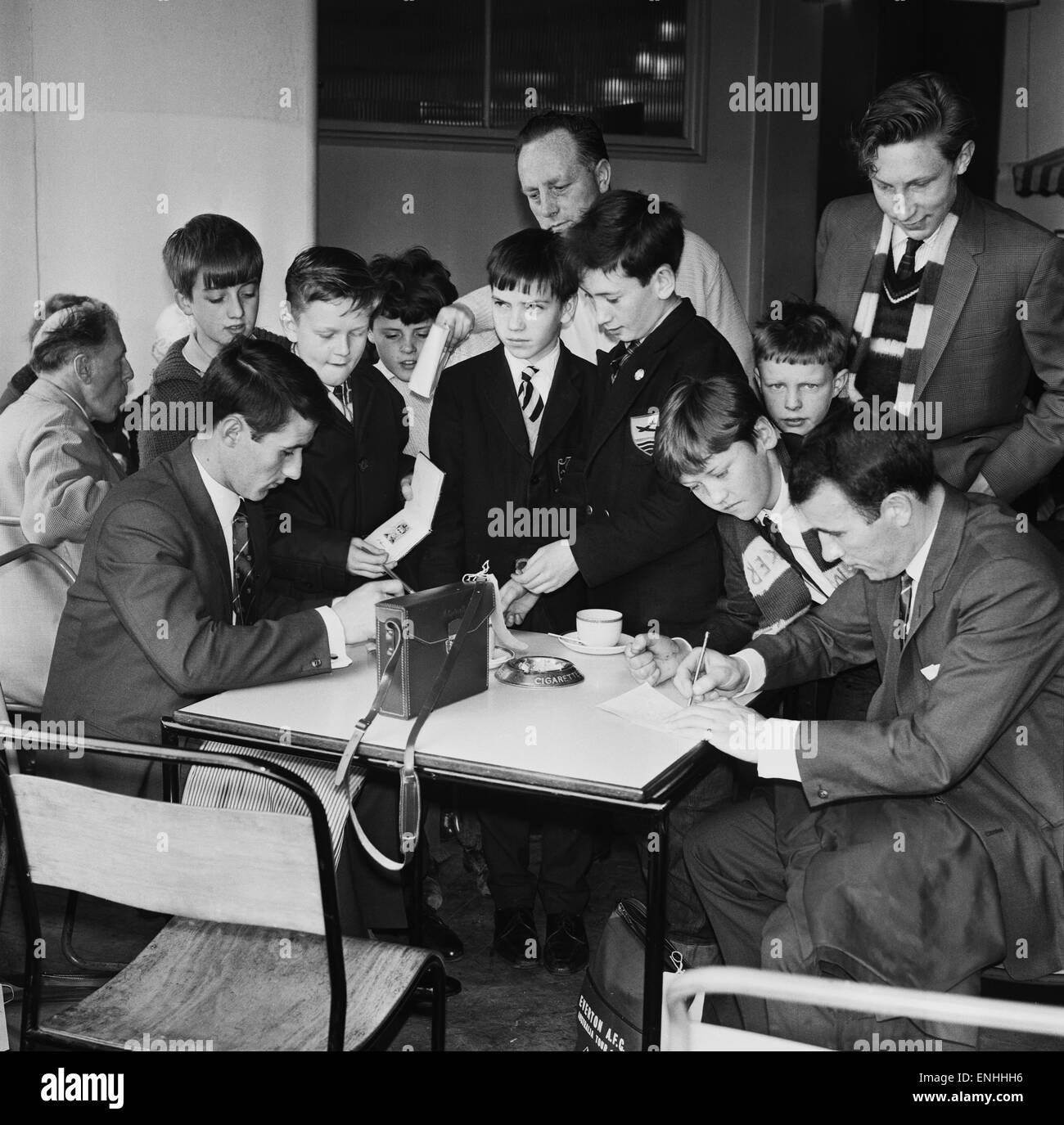 Everton players Derek Temple and Dennis Stevens sign autographs for ...