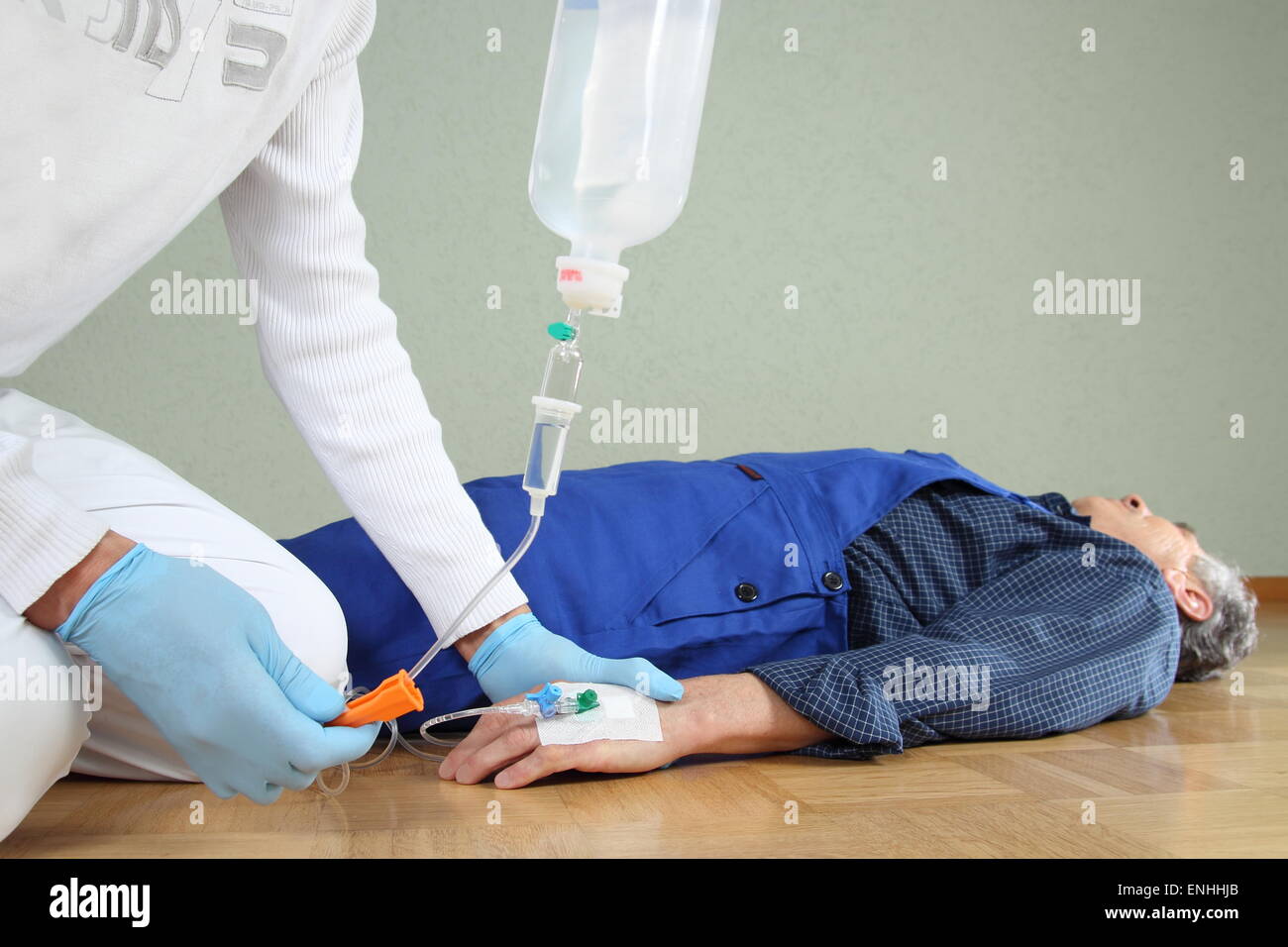 A Emergency service giving a infusion to a patient Stock Photo - Alamy