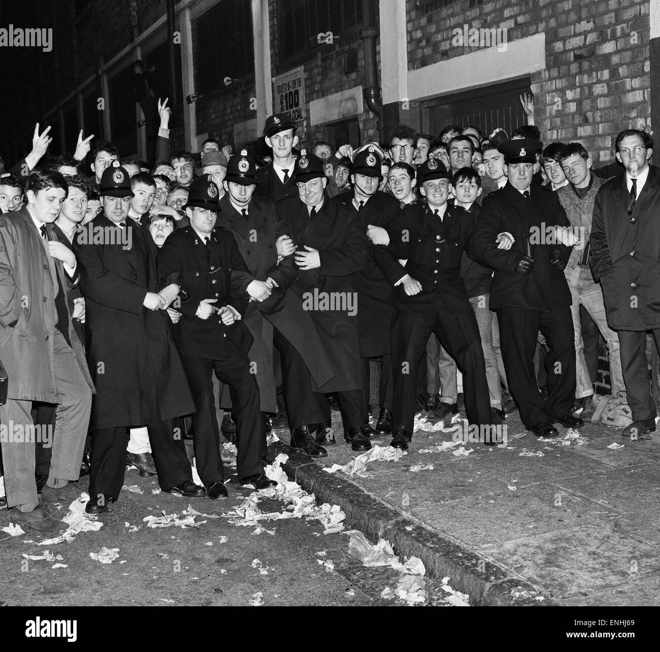 Police holding back large crowds of Everton fans who are queuing for ... Police holding back large crowds of Everton fans who are queuing for ...