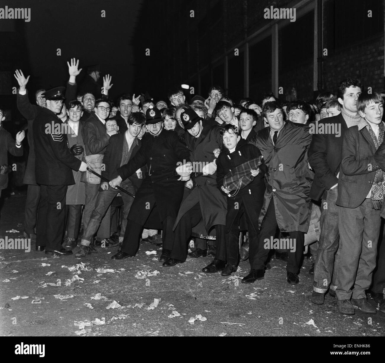 Police holding back large crowds of Everton fans who are queuing for ... Police holding back large crowds of Everton fans who are queuing for ...
