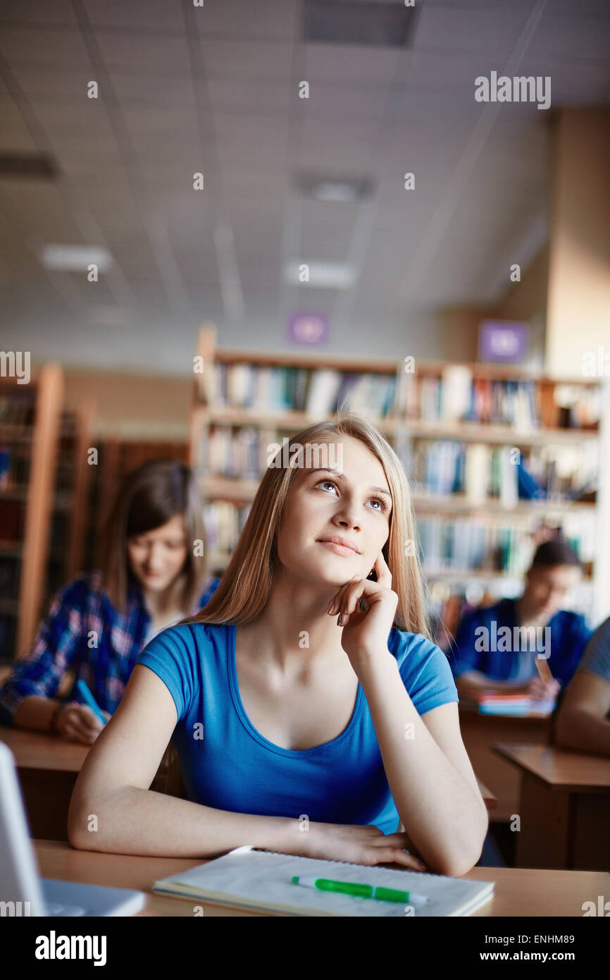 Cute girl daydreaming at lesson in college Stock Photo - Alamy