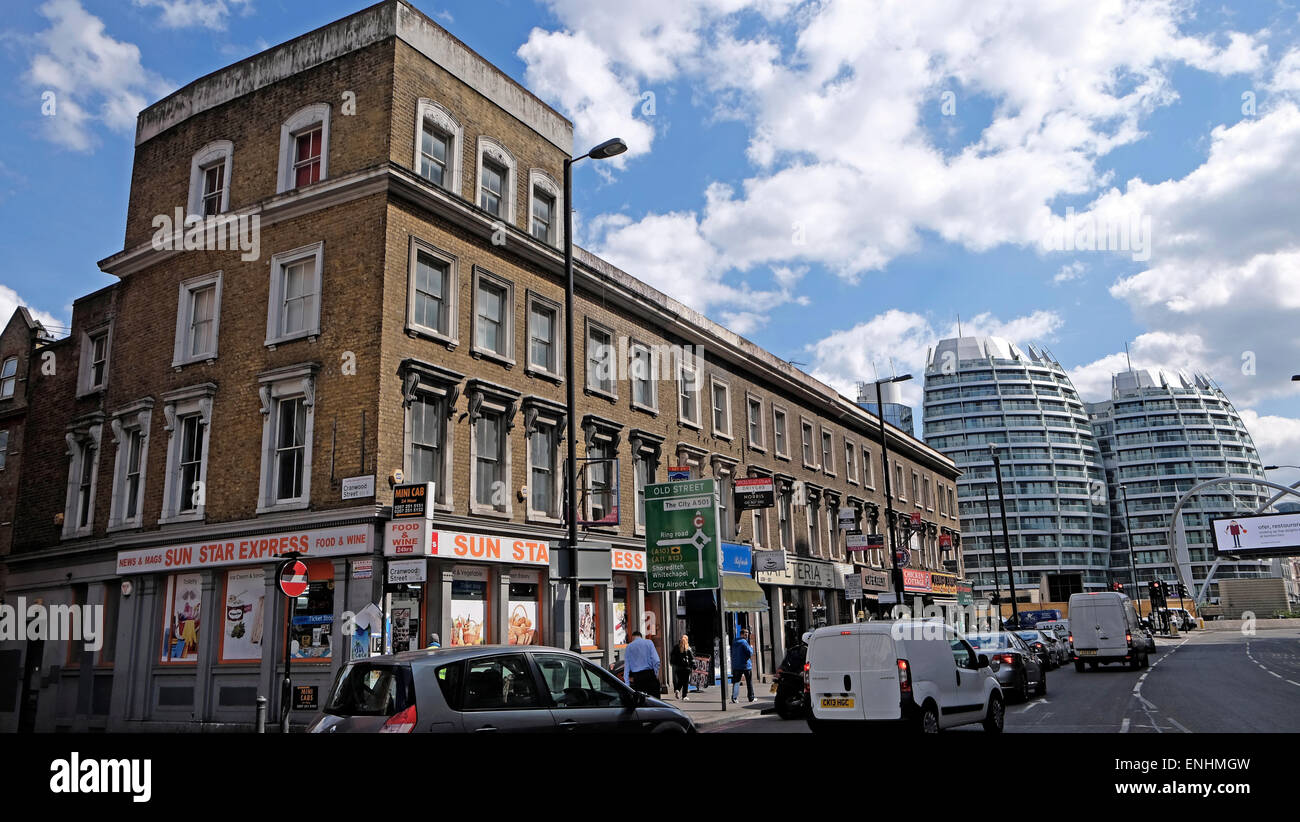 A view of terraced shops and flats on City Road leading to Old Street ...