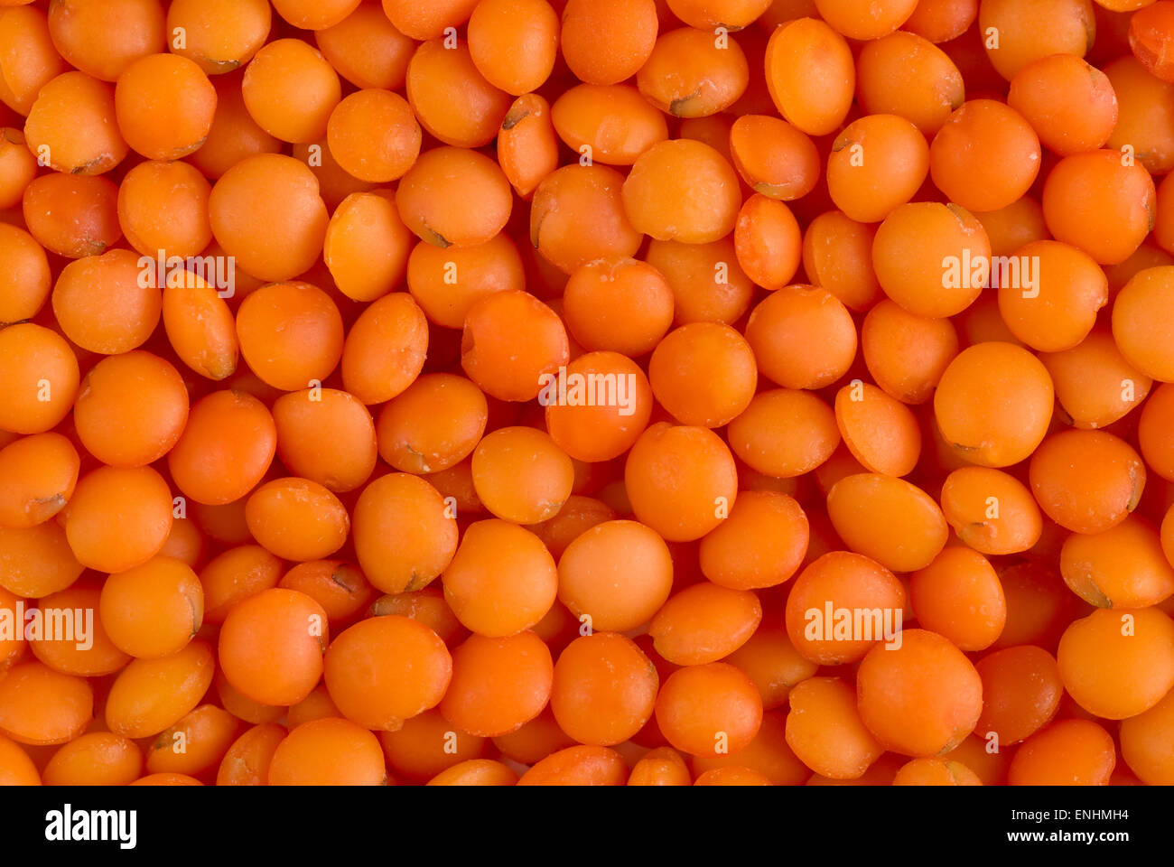Red lentils full frame close up background Stock Photo - Alamy
