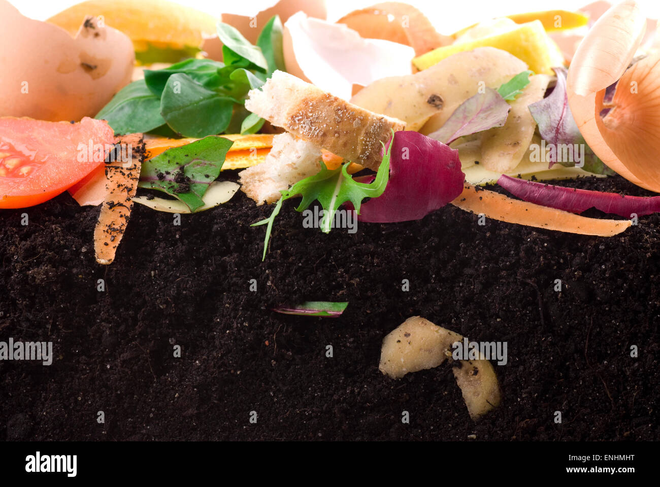 Compost material on soil. Cross section. Close up Stock Photo - Alamy