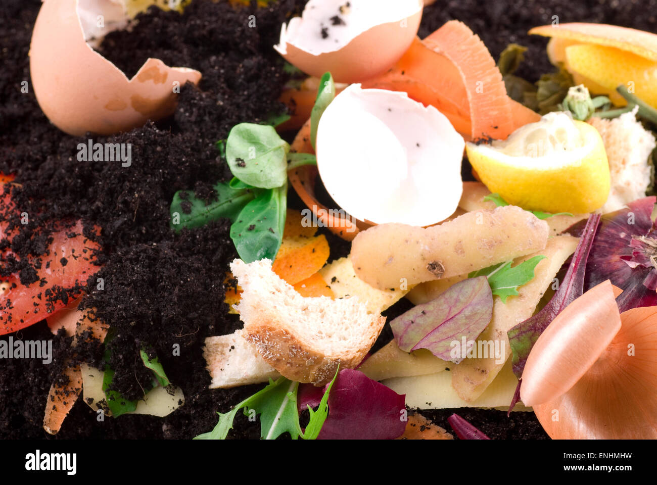 Compost material on soil. Cross section. Close up Stock Photo - Alamy