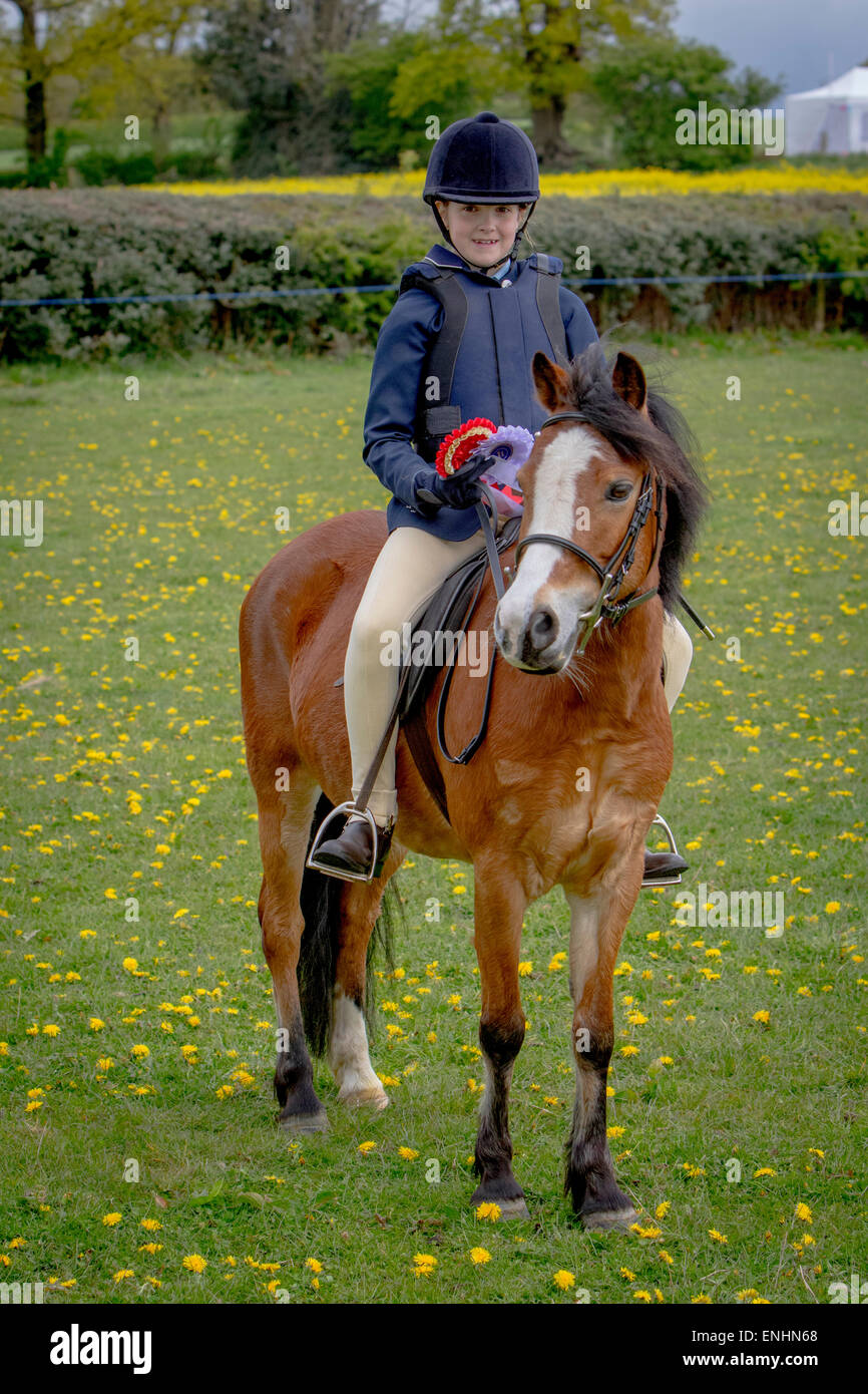 Riders and their horses take part in a local Riding Club Show held at ...