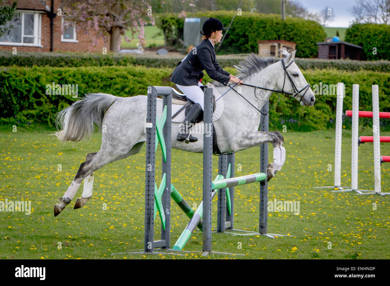 Riders and their horses take part in a local Riding Club Show held at ...