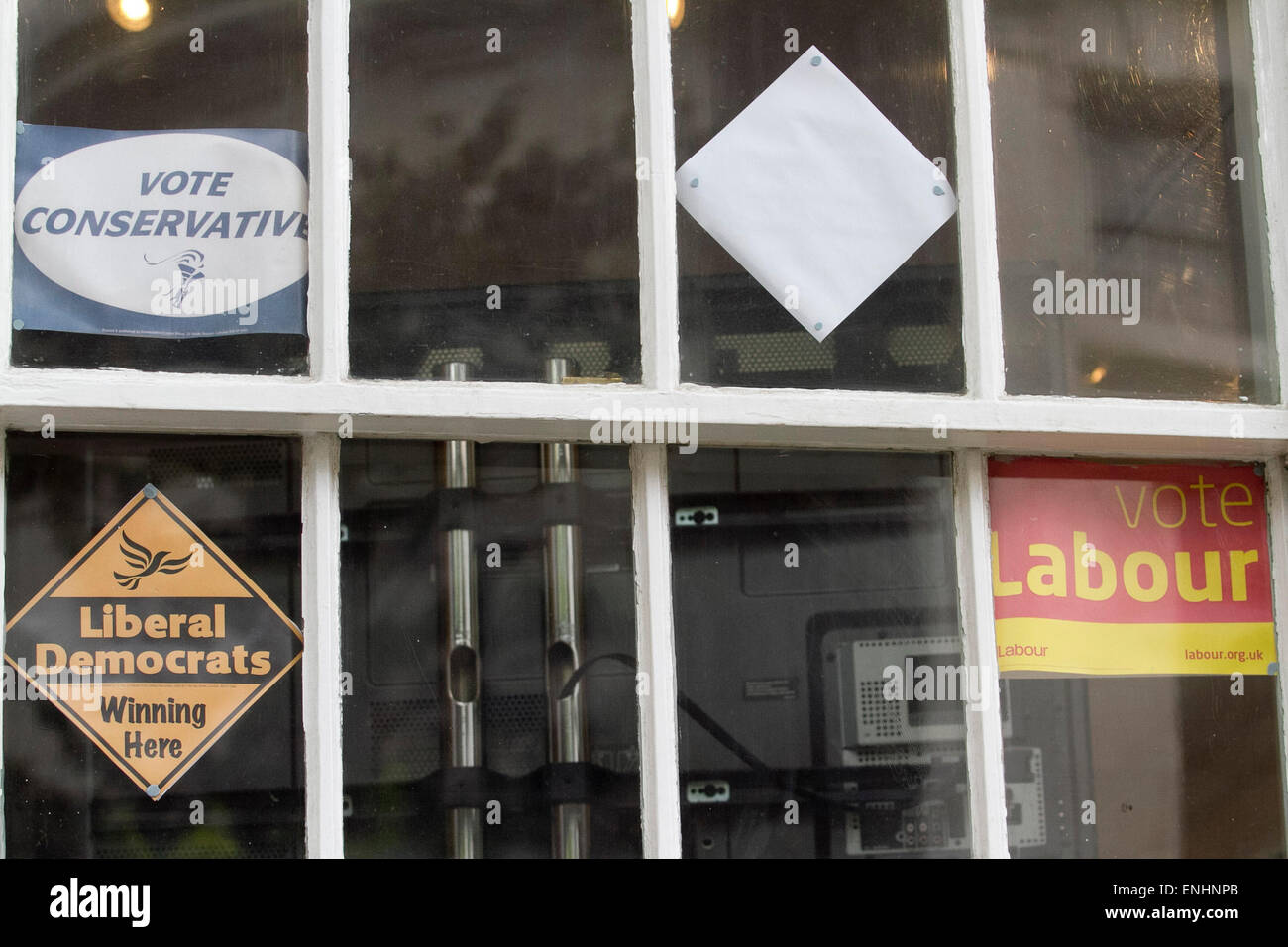 London, UK. 6th May, 2015. Party political signs on a window with one ...