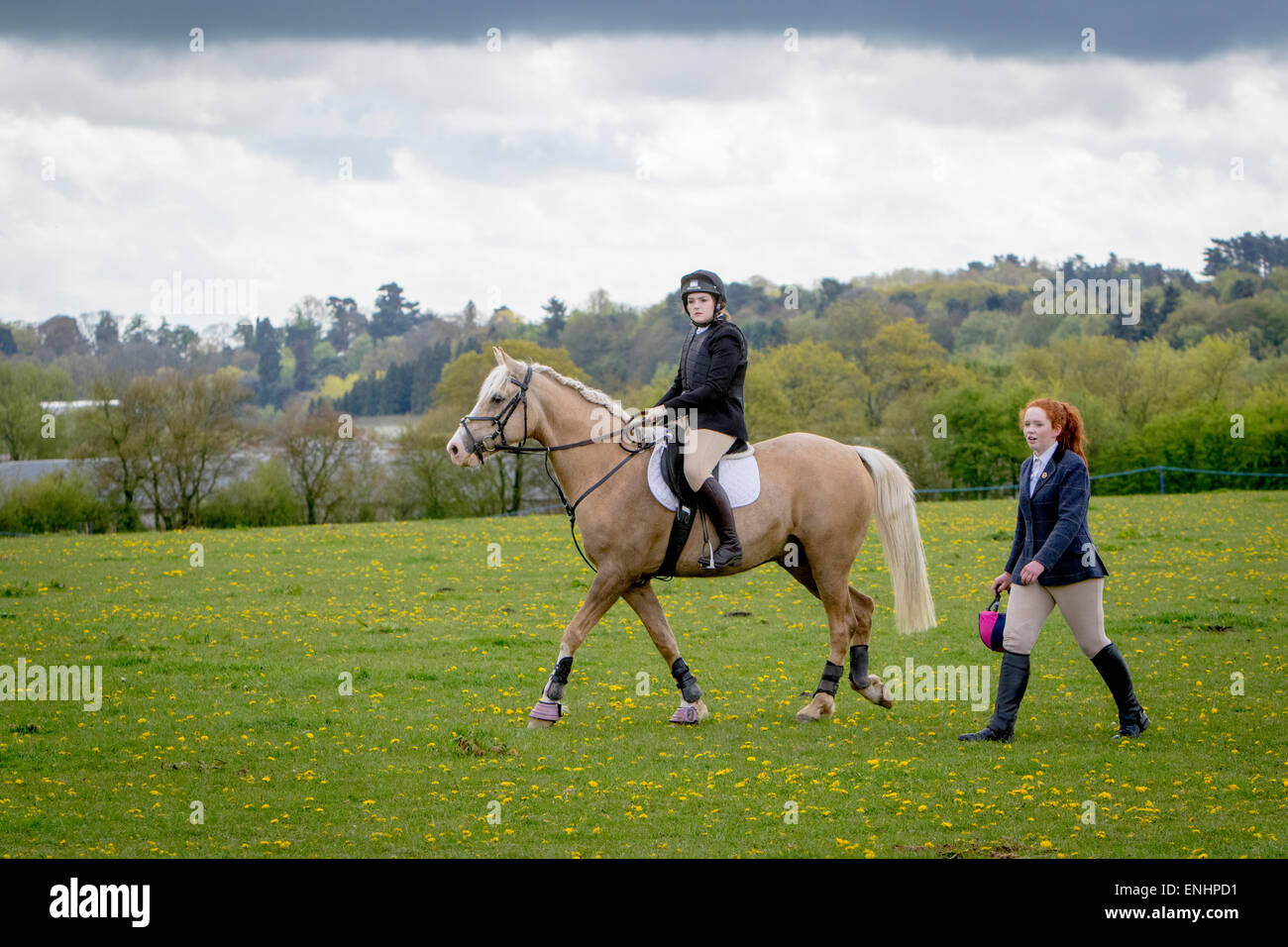 Riders and their horses take part in a local Riding Club Show held at ...