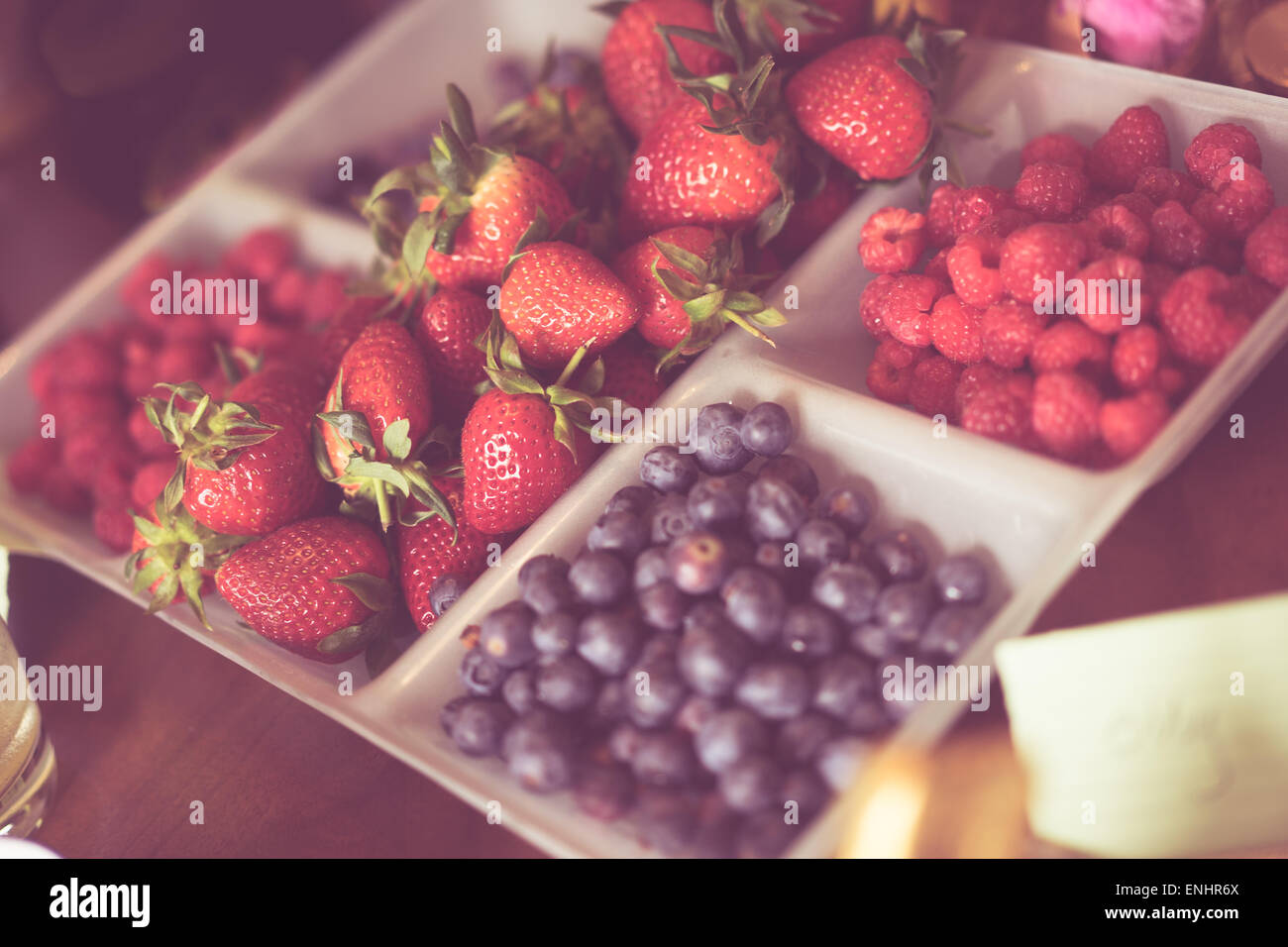 A selection of berries at Easter on a dining table Stock Photo - Alamy
