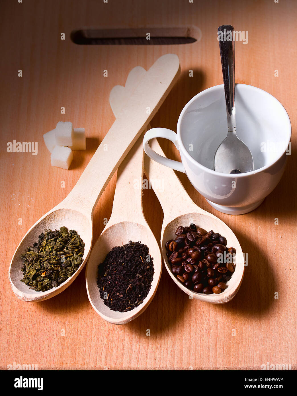 three spoons with green and black tea and spoon cup of coffee Stock ...