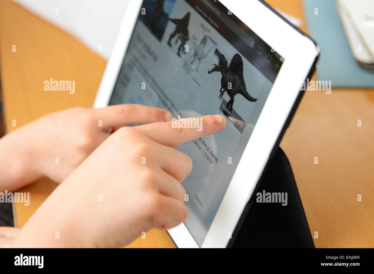 Hand to Ipad Stock Photo - Alamy