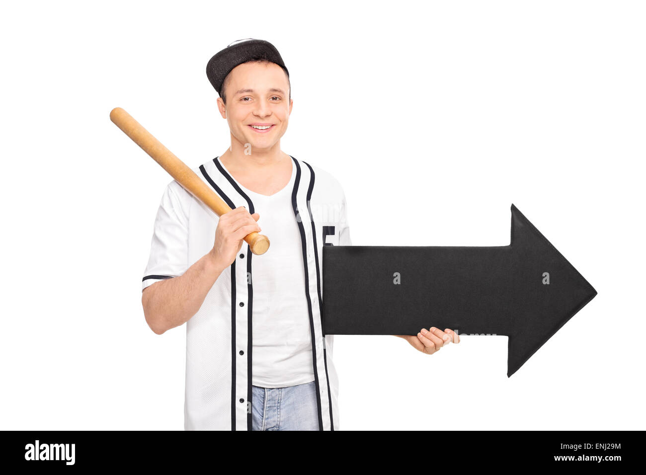 Young man in a baseball shirt holding a baseball bat and an arrow ...
