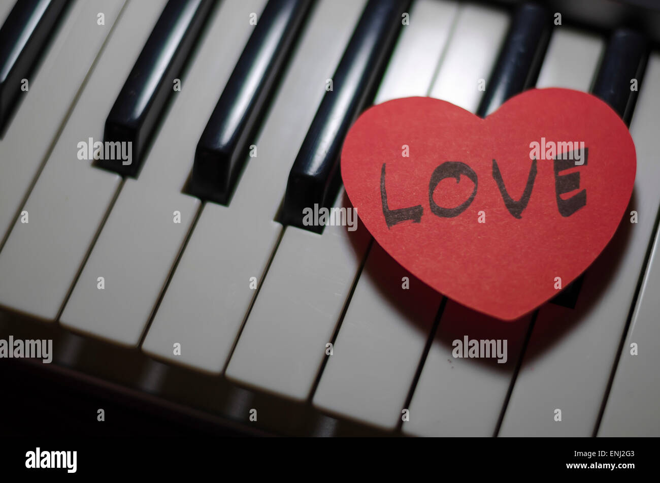 heart on key piano say love music Stock Photo - Alamy