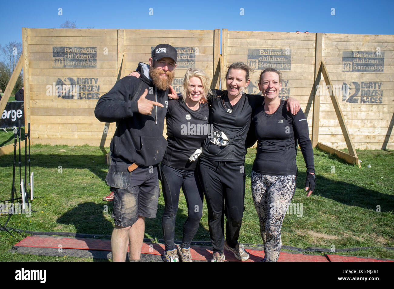 Doug Spence, founder of Dirty Dozen Race with runners at Finish line ...