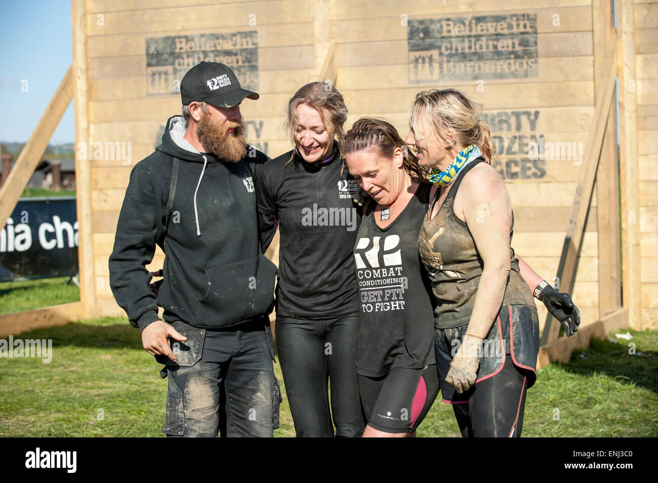 Doug Spence, founder of Dirty Dozen Race with runners at Finish line ...