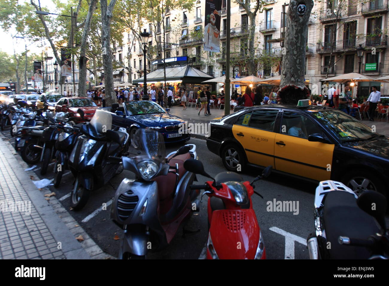 Motorcycles parked along La Rambla street in Barcelona, Catalunya ...