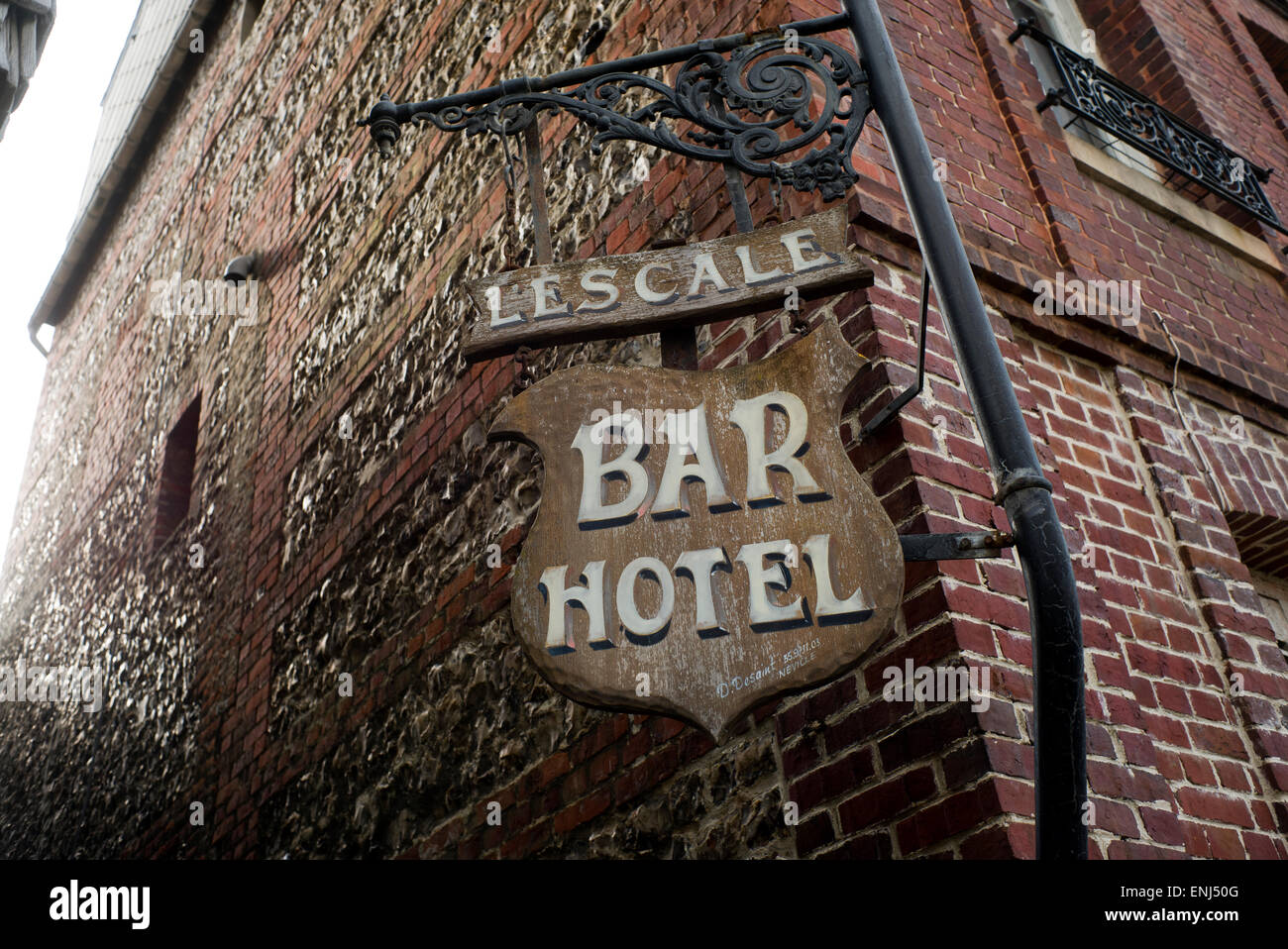 Old painted wooden hanging bar hotel sign, Normandy, France Stock Photo ...