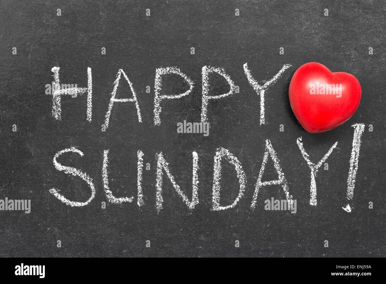 happy Sunday phrase handwritten on blackboard with heart symbol Stock ...