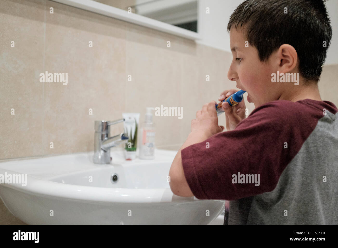 Child Brushing Teeth Sink Stock Photos & Child Brushing Teeth Sink ...