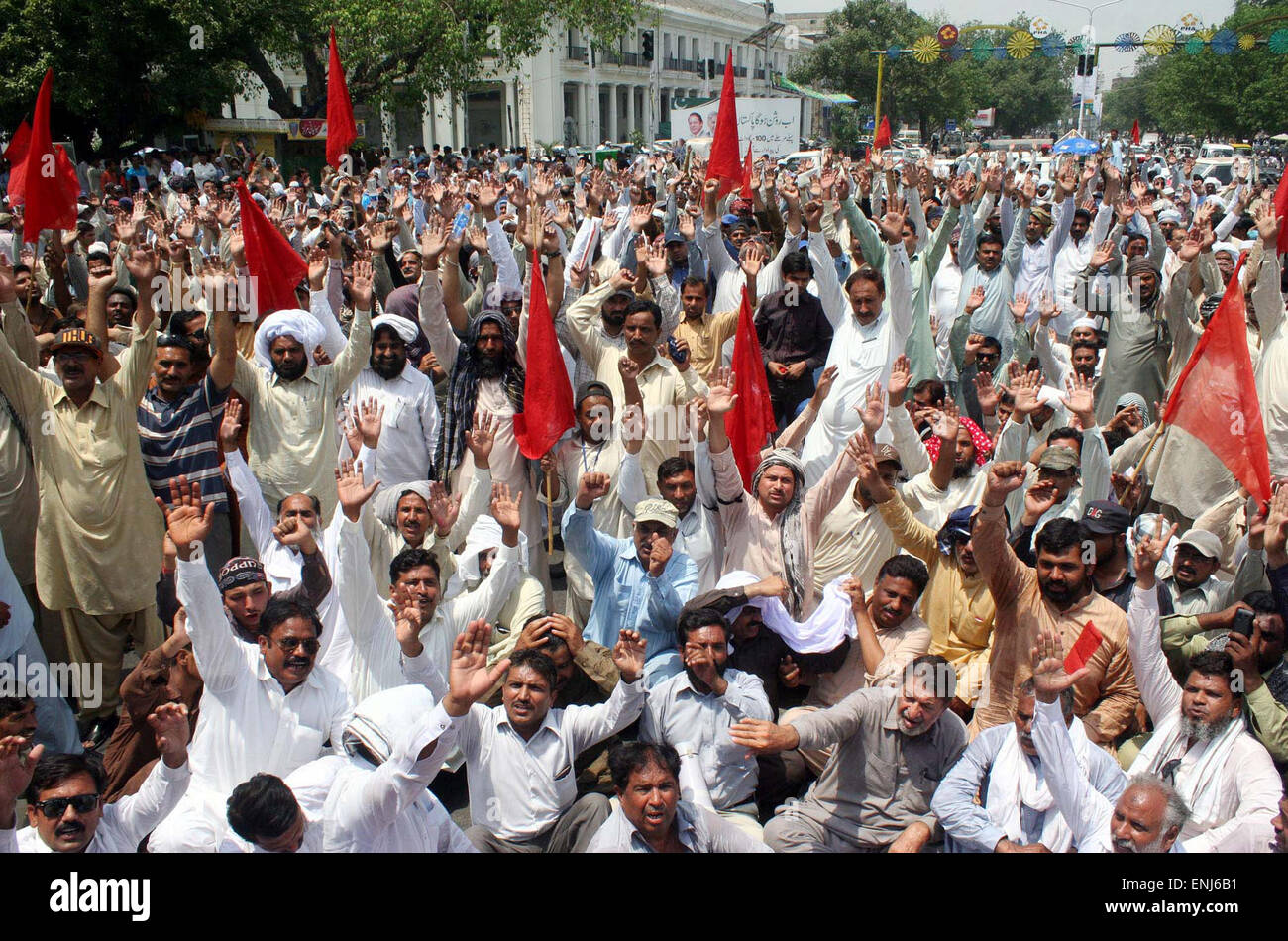 Members of All Pakistan WAPDA Hydro Electric Central Labor Union chant ...