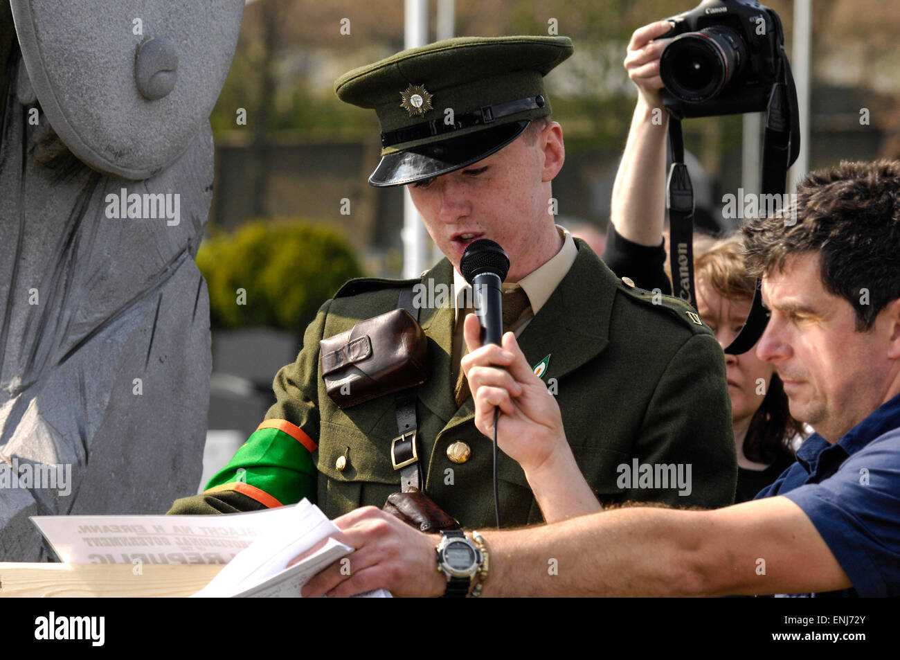 A man dressed in 1916 Irish Volunteers reads the Irish Proclamation at ...