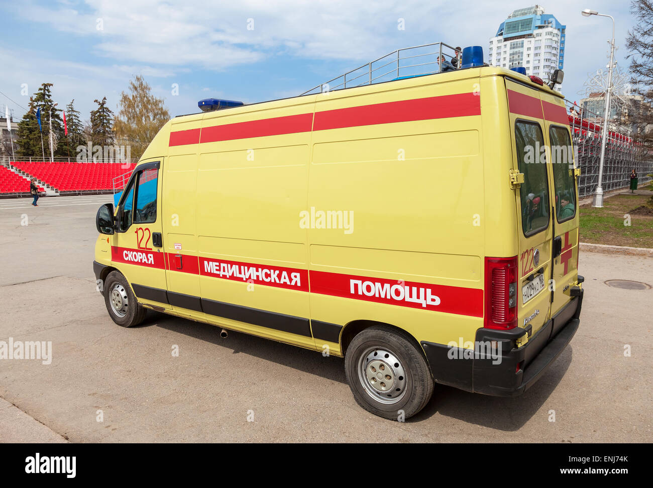 Ambulance car parked up in the street. Text on russian: "Acute care ...