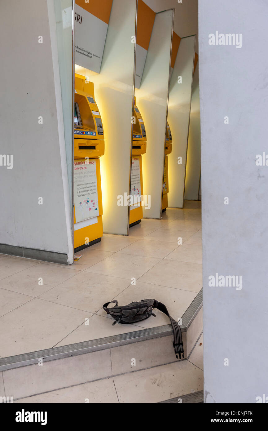 Discarded money belt/ bum bag beside cash machines. Bangkok. Thailand ...