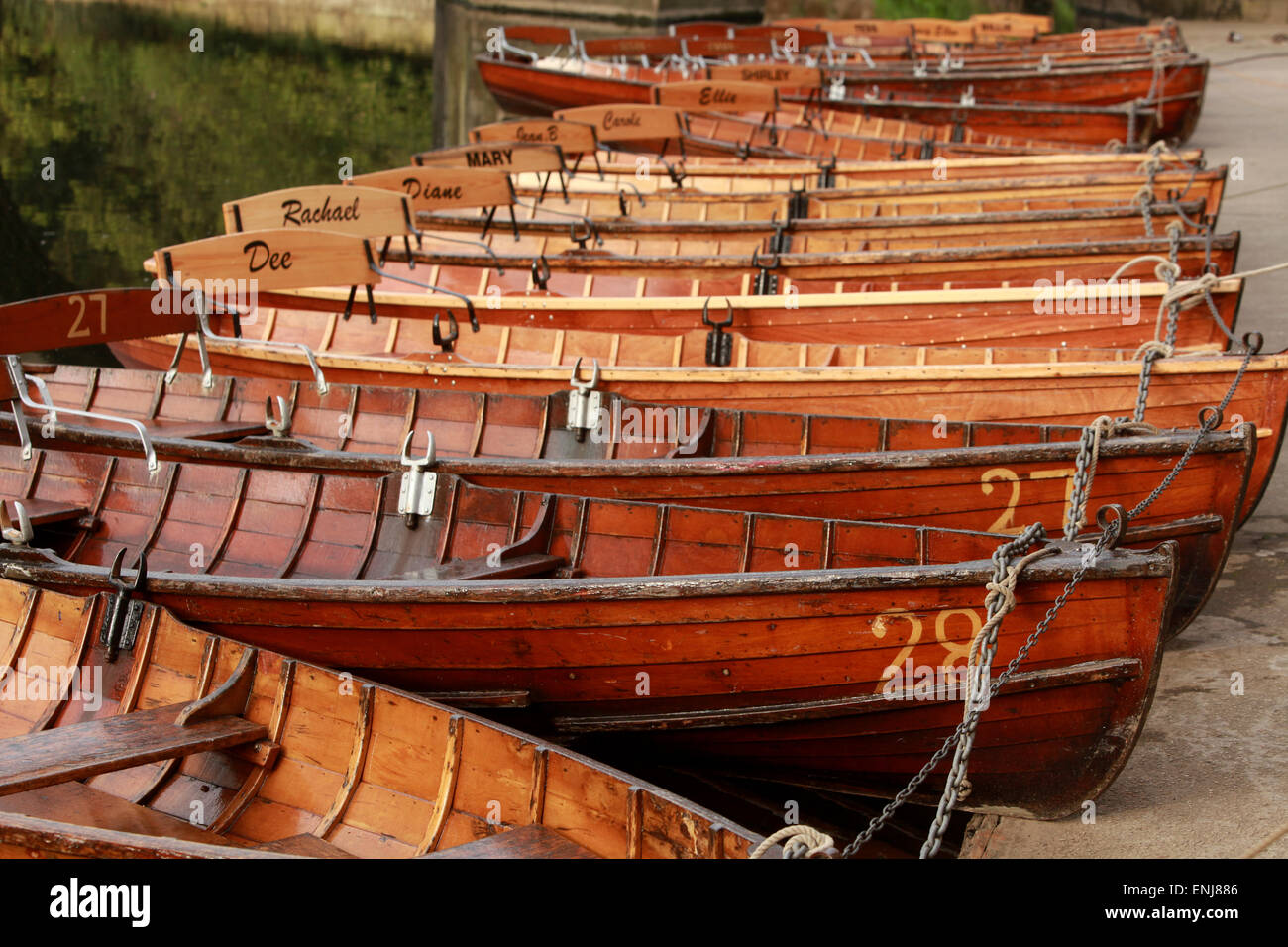 Classic wooden rowing boats on the River Wear by Elvet Bridge Durham UK ...