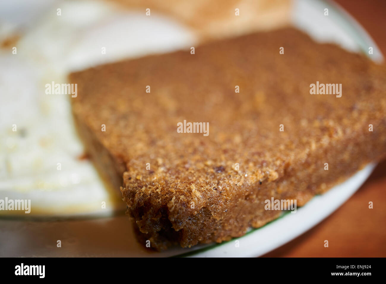 A slice of scrapple on a plate in a Pennsylvania diner Stock Photo - Alamy